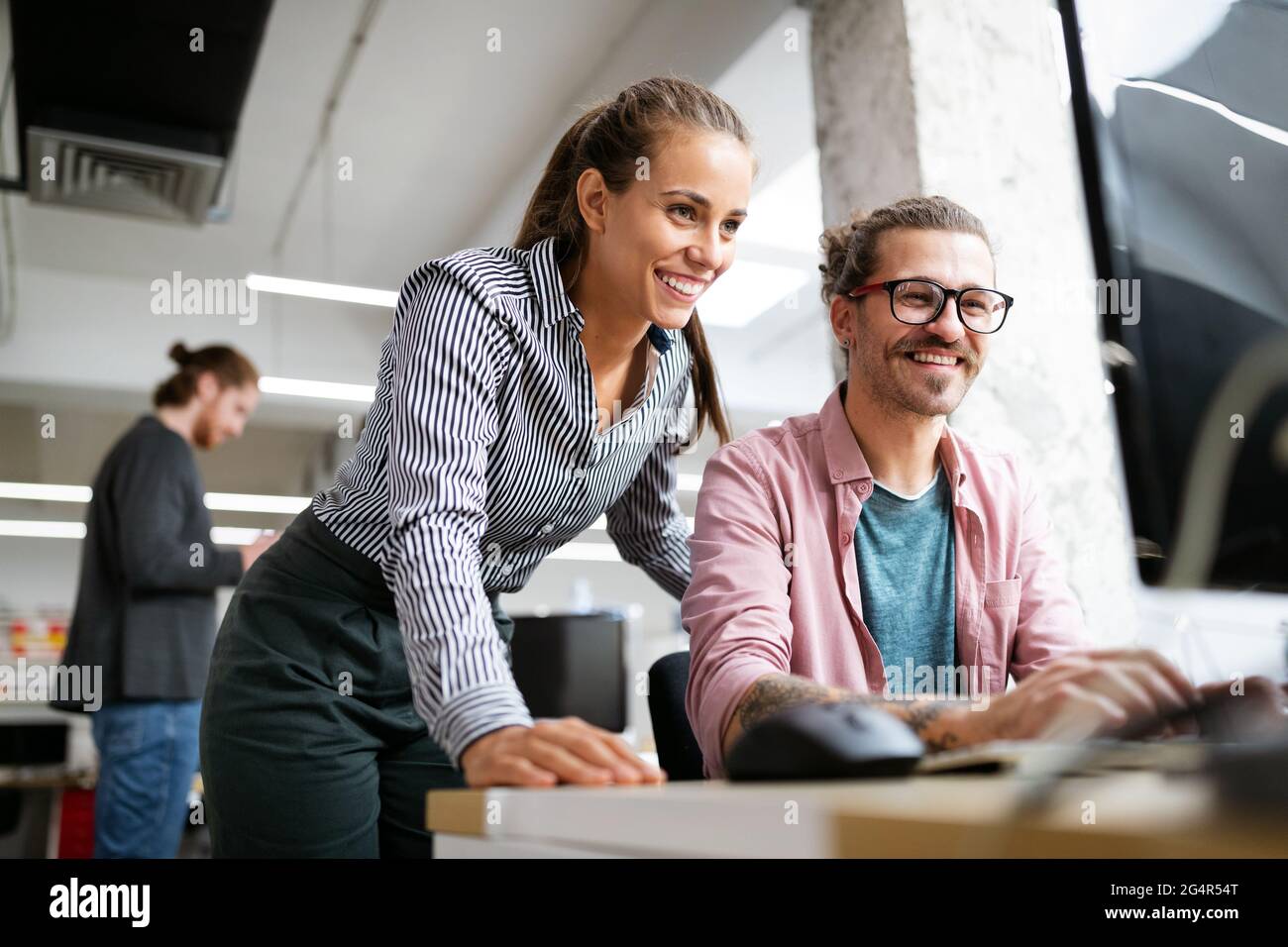 Programmer working in a software developing company Stock Photo - Alamy