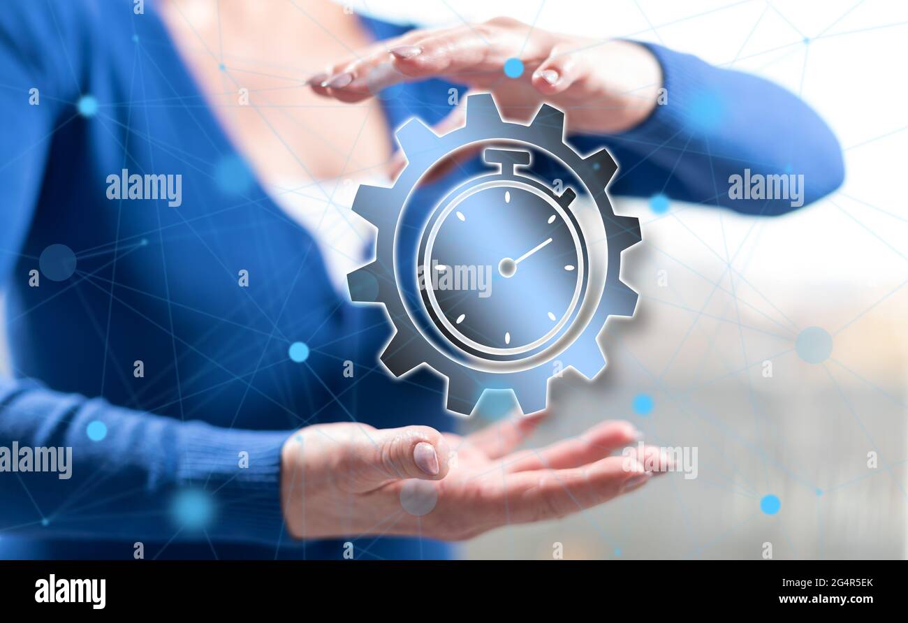 Time management concept between hands of a woman in background Stock ...