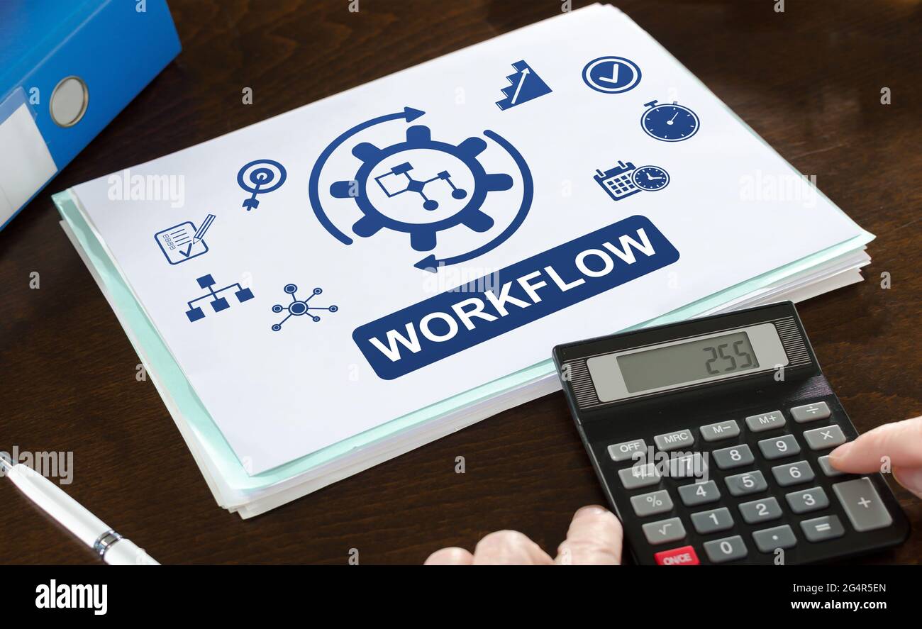 Workflow concept illustrated on a paper with a calculator Stock Photo ...