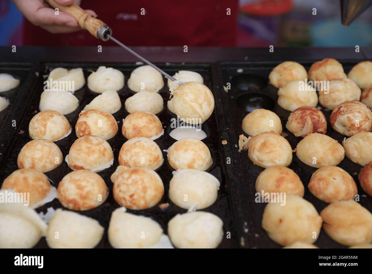Small octopus balls Stock Photo - Alamy