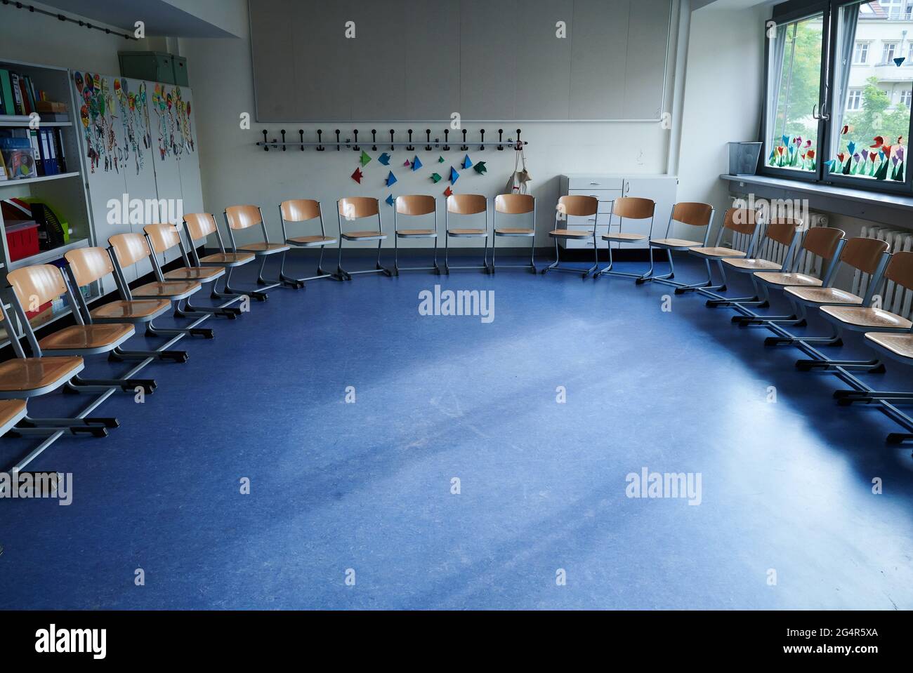 Berlin, Germany. 23rd June, 2021. The chairs in the classroom of a ...