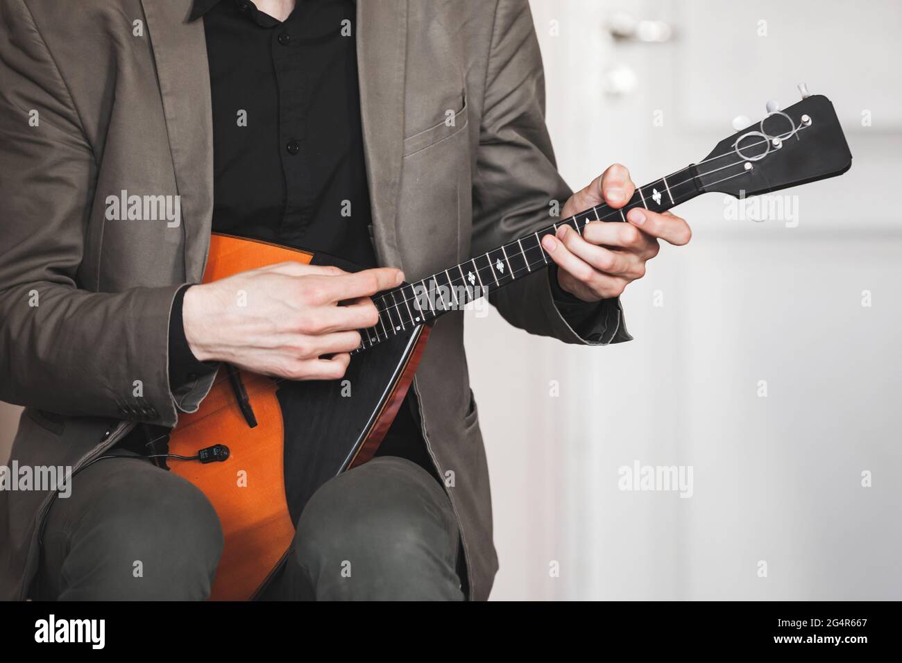 Balalaika player hi-res stock photography and images - Alamy