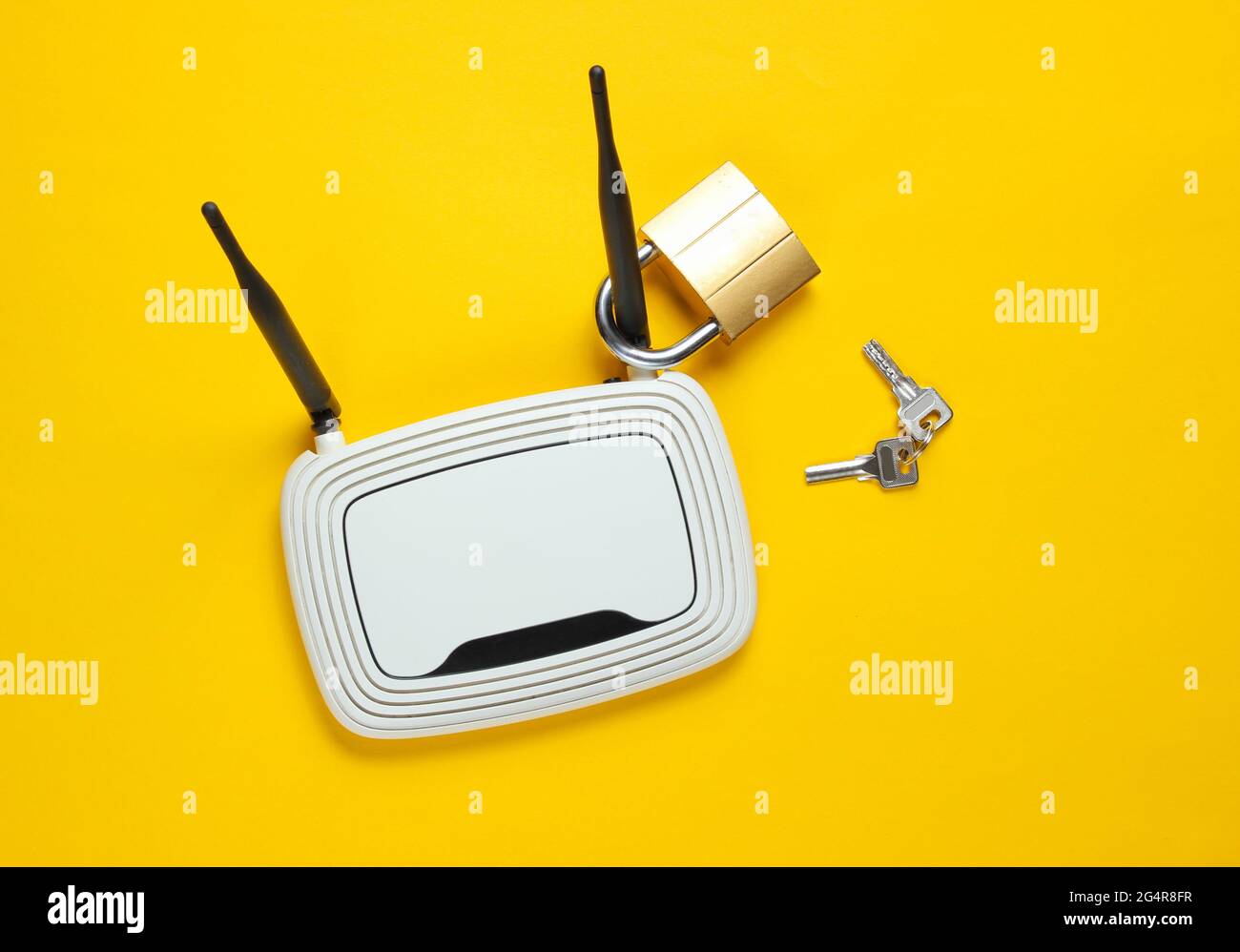 Wi-fi router with lock on yellow background. Minimalism. Top view Stock ...