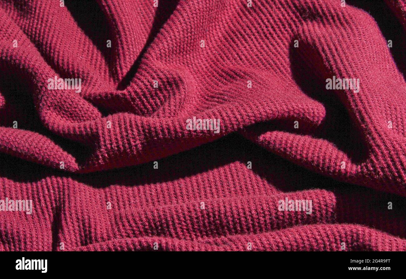 Background of crumpled red fabric texture closeup Stock Photo - Alamy