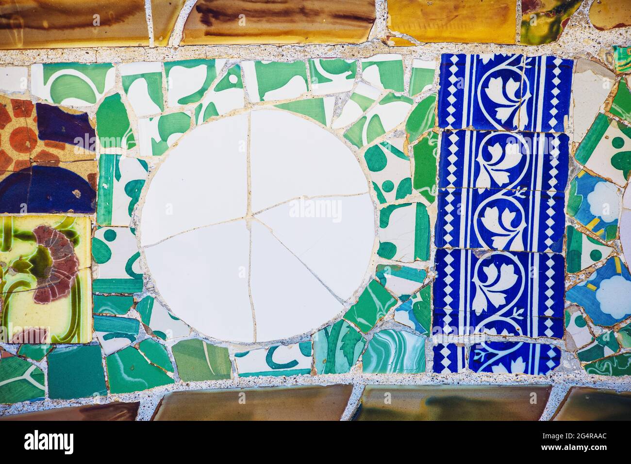 abstract ceramic mosaic tiles pattern in Barcelona park Guell. Spain ...