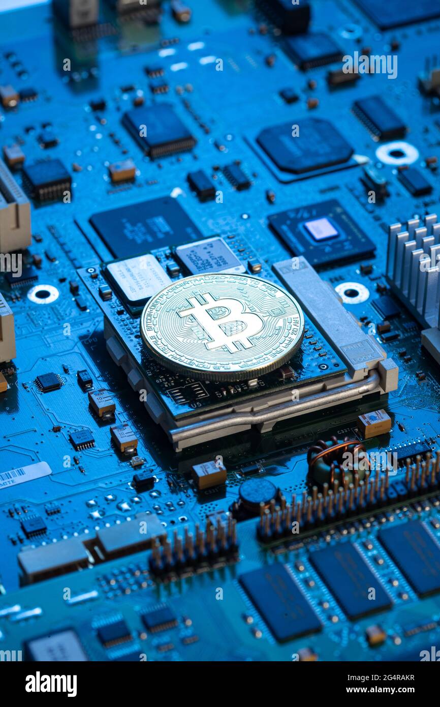 Circuit chip, and COINS Stock Photo - Alamy