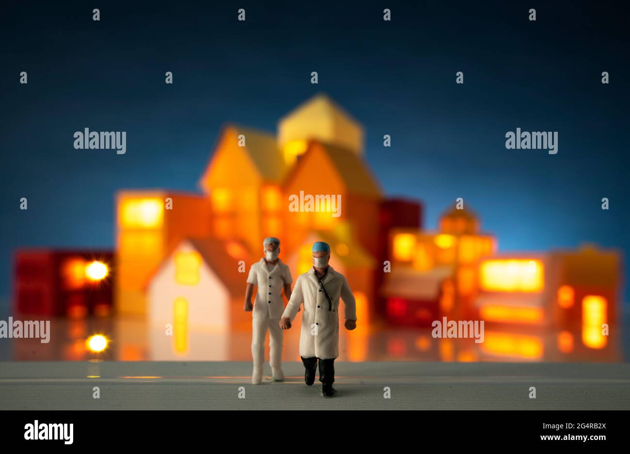 Building blocks and human image model Stock Photo - Alamy