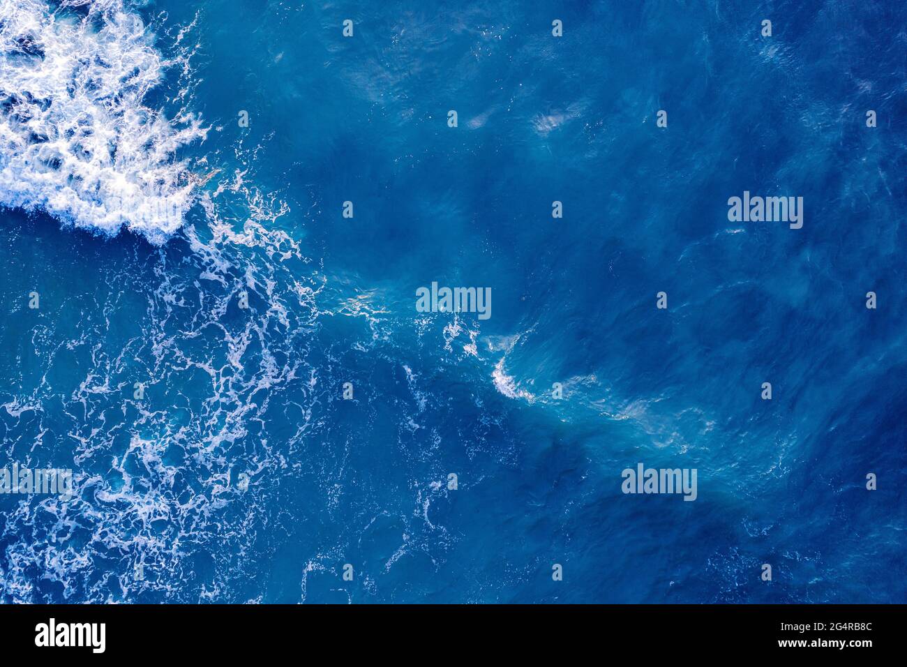 Blue water frothy indonesia ocean surface with big wave. Open sea from ...