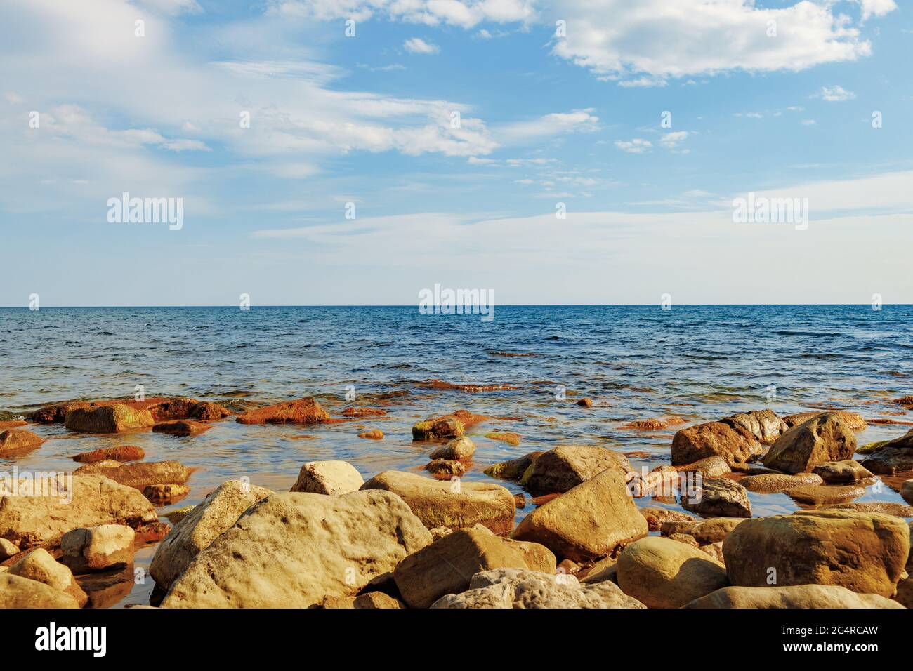 Stony sea shore photo for a background Stock Photo - Alamy