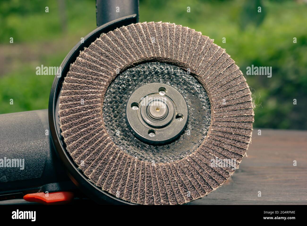 Abrasive wheel for a grinder. Angle grinder. Hand tool for grinding ...