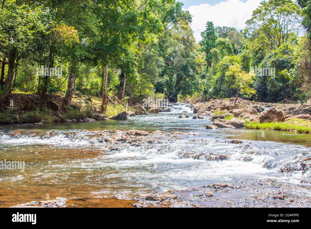 Water flowing from the scenic waterfall in Pakse, Laos, Southeast Asia ...