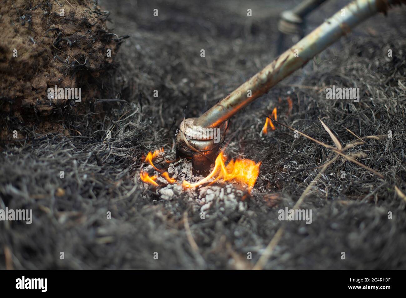 The supermarket cart is on fire. A grocery basket caught fire in the ...