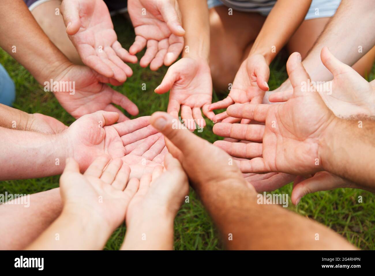 Stack of hands - real people agreement Stock Photo - Alamy