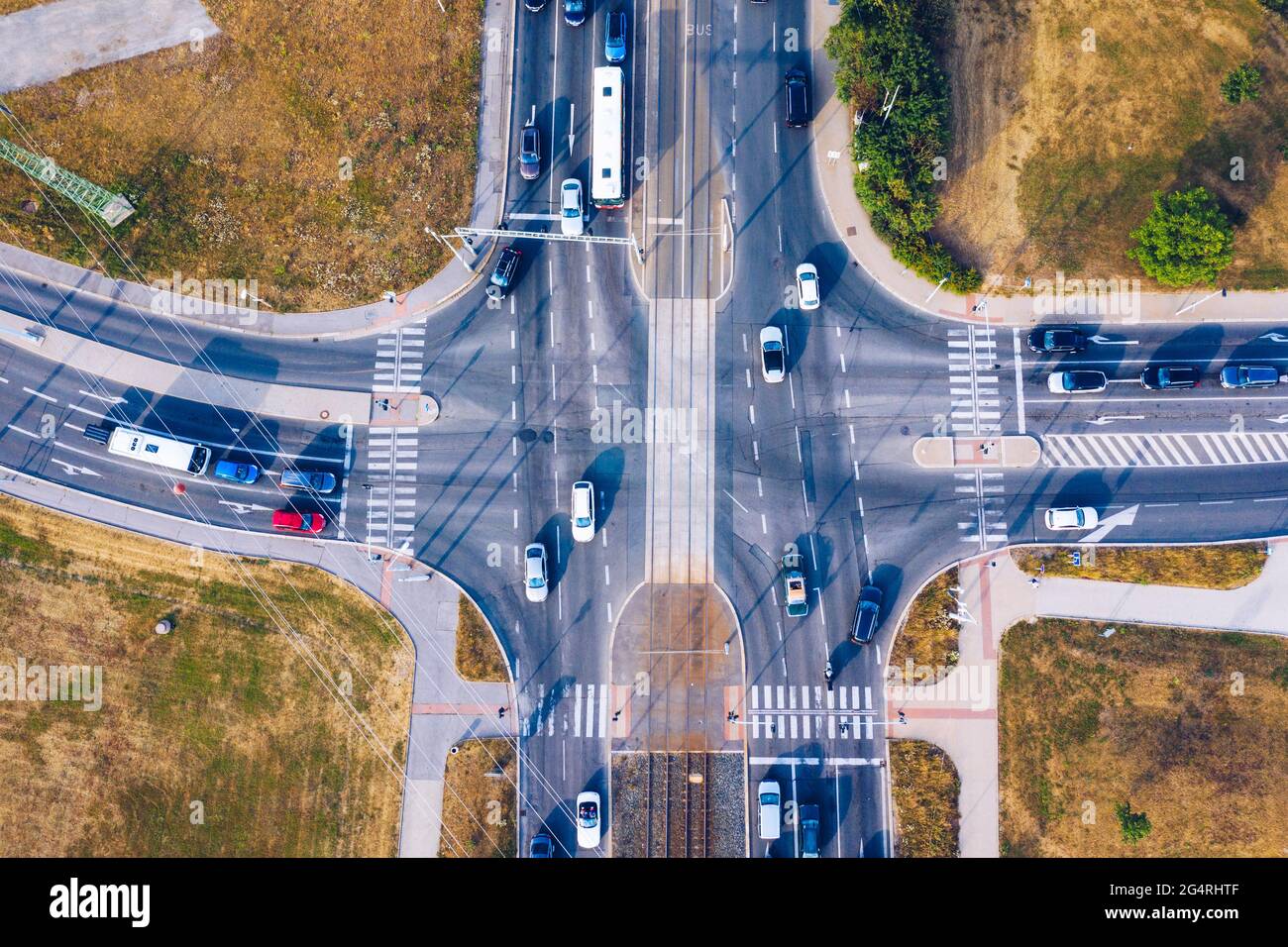 Aerial top view of crossroads with lot of vehicles or car traffic ...