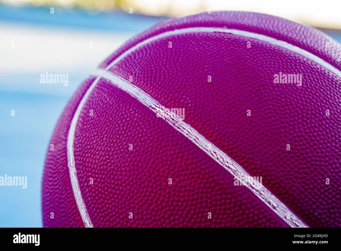 Purple basketball closeup on the playground Stock Photo - Alamy