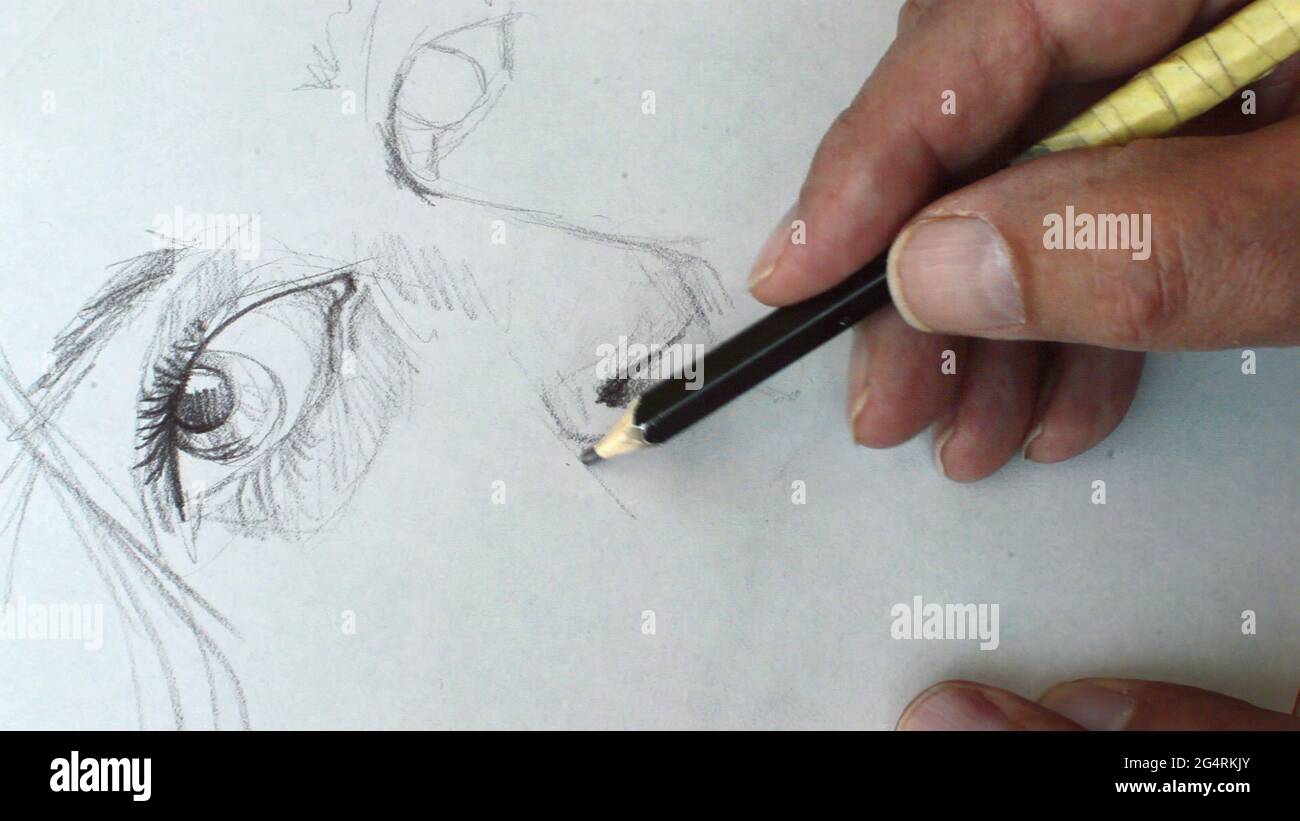 3d illustration - Drawing Eyes With Pencil In Sketchbook Stock Photo ...