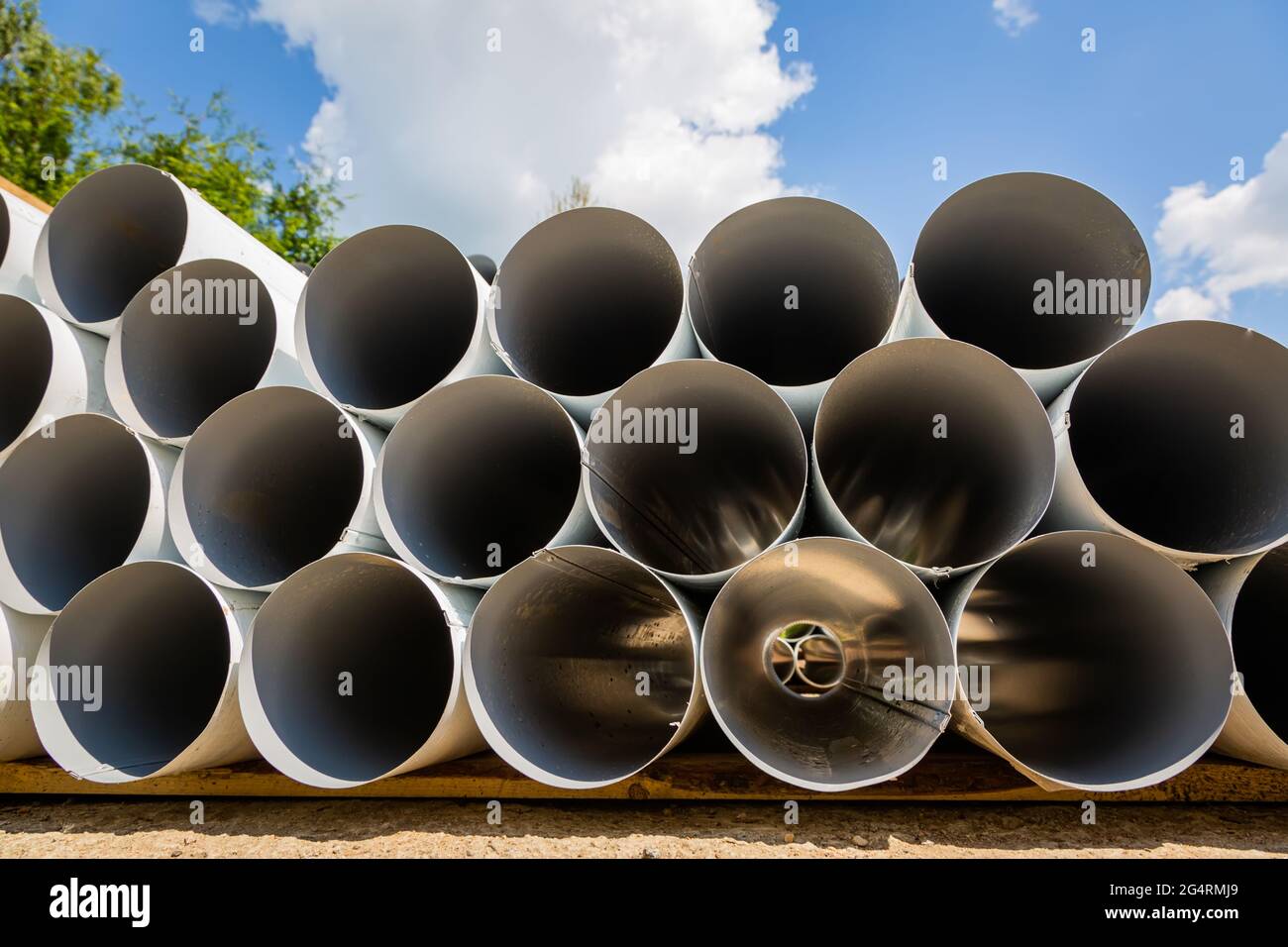 Downpipe warehouse. Steel pipes, parts for the construction of a roof ...