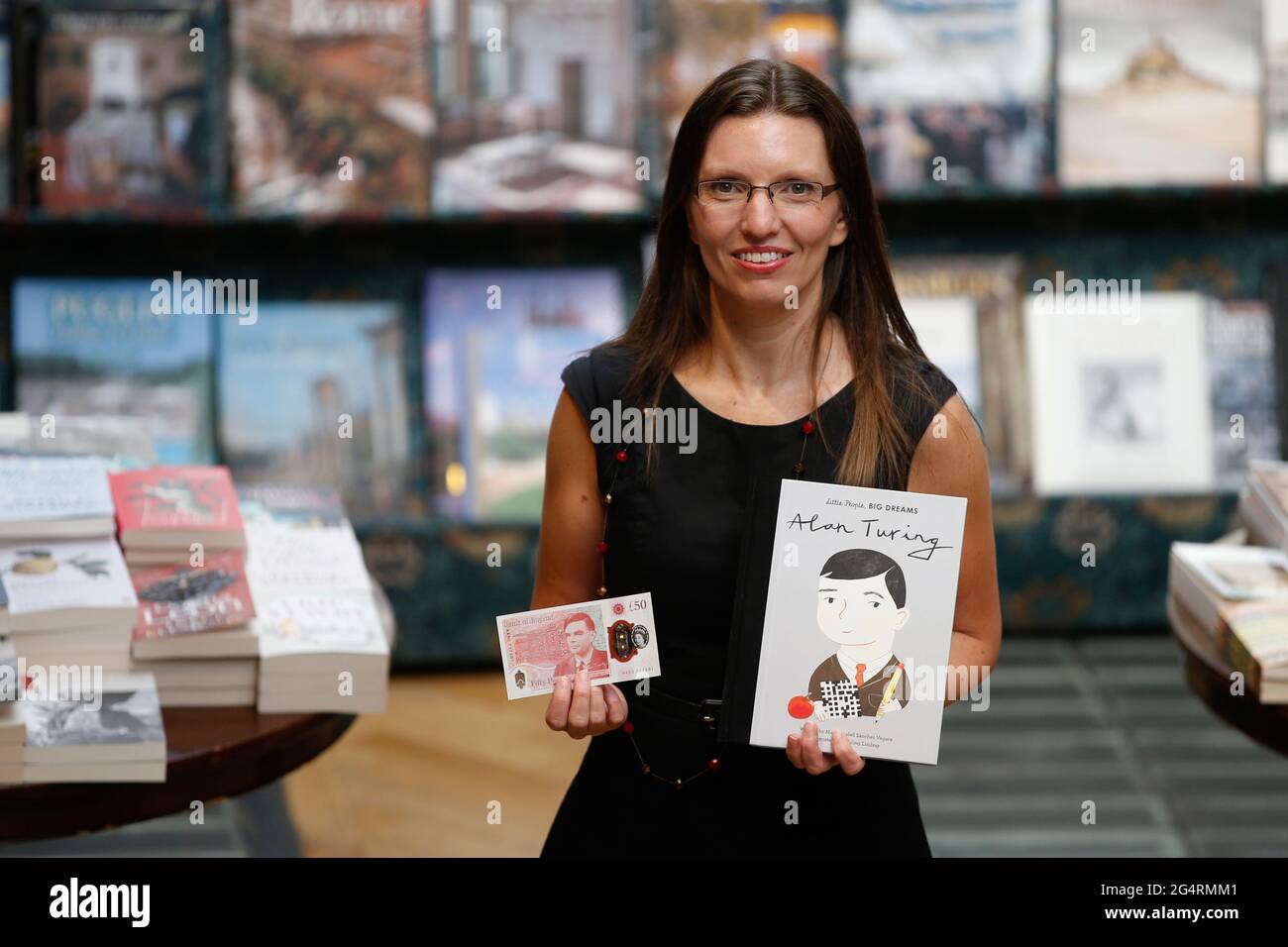 Sarah John, chief cashier of the Bank of England, with a new 50-pound ...