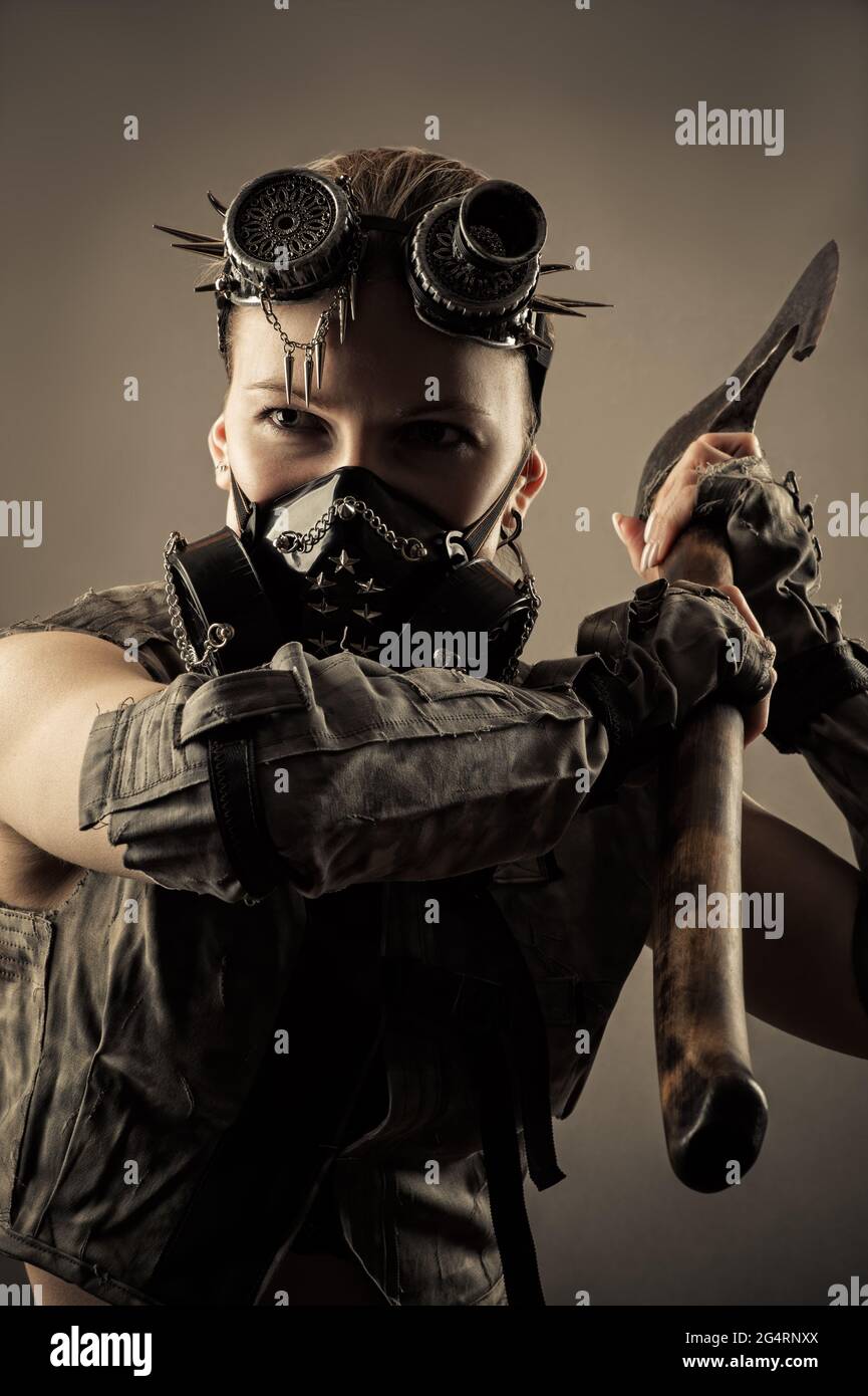 woman in cyberpunk style mask hit with an axe Stock Photo - Alamy
