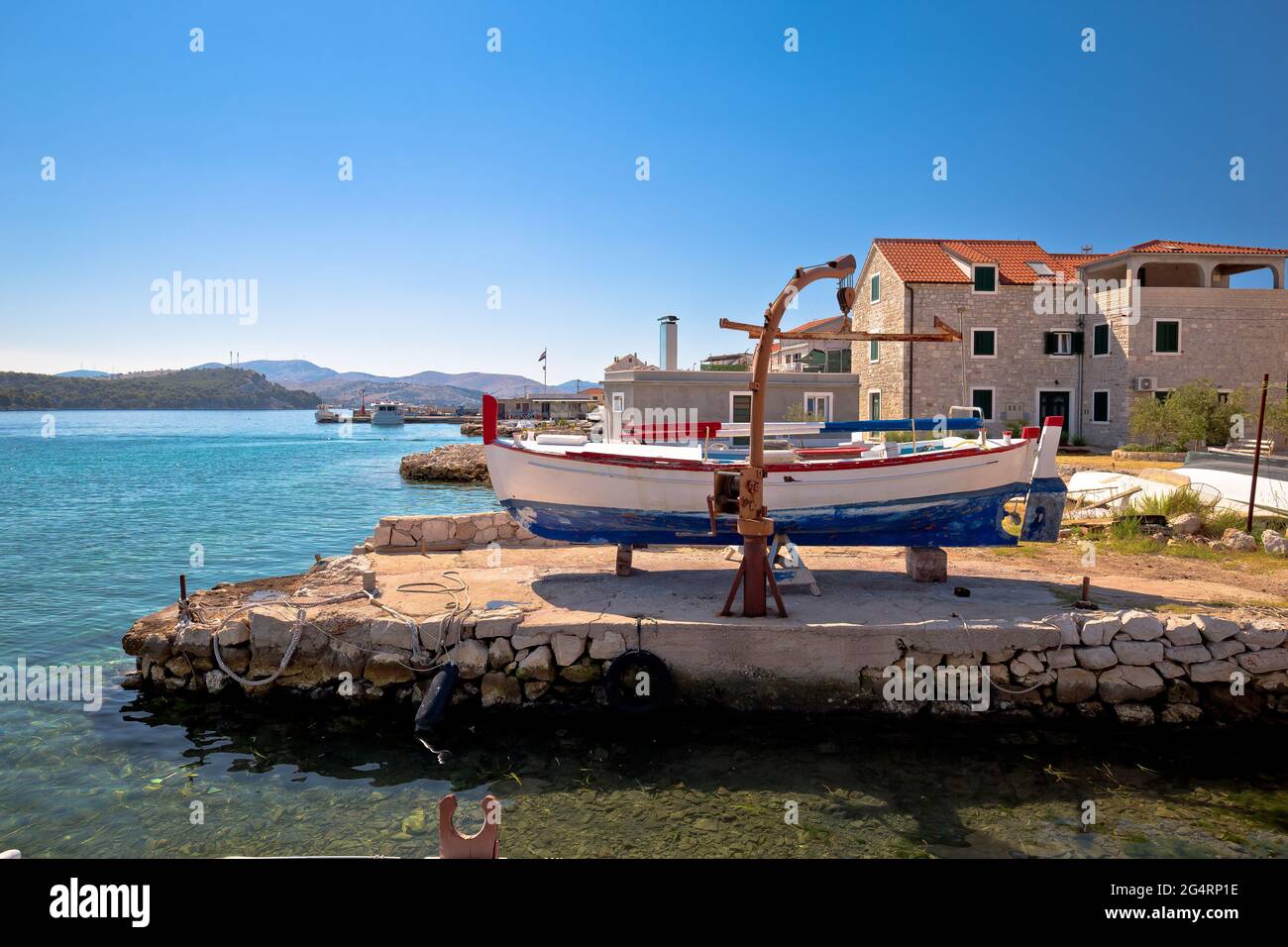 Colorful harbor and waterfront of Krapanj island, sea sponge harvesting ...