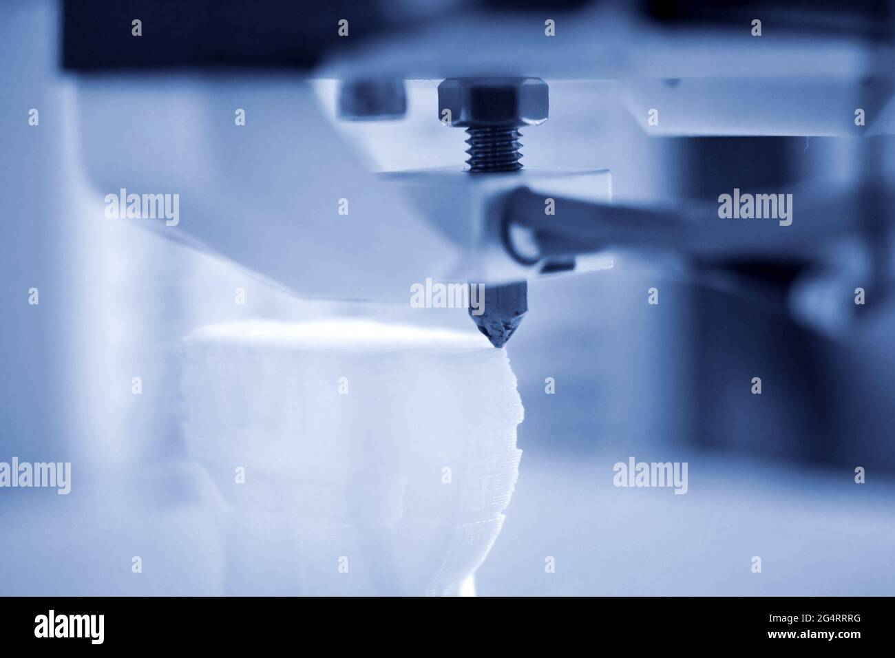 The process of working 3D printer and creating a three-dimensional object Stock Photo - Alamy