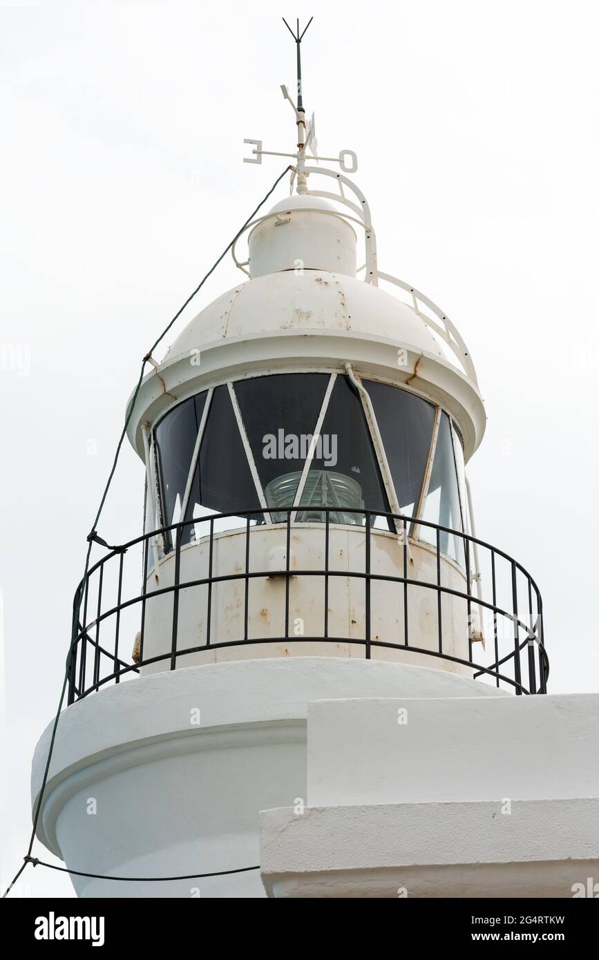 View of lighthouse on coast Stock Photo - Alamy