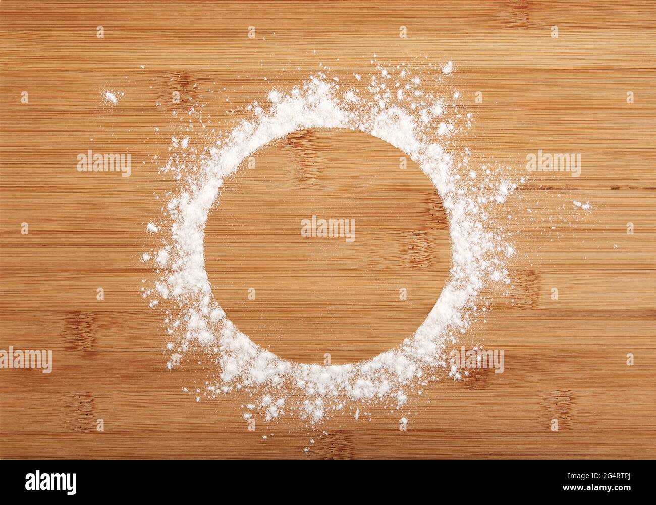 Round flour frame on a wooden bamboo background Stock Photo - Alamy