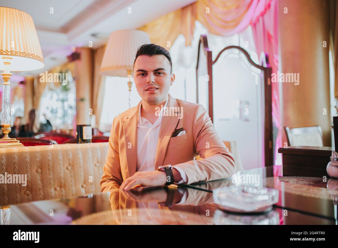 Young handsome Caucasian male wearing a nice elegant suit Stock Photo ...