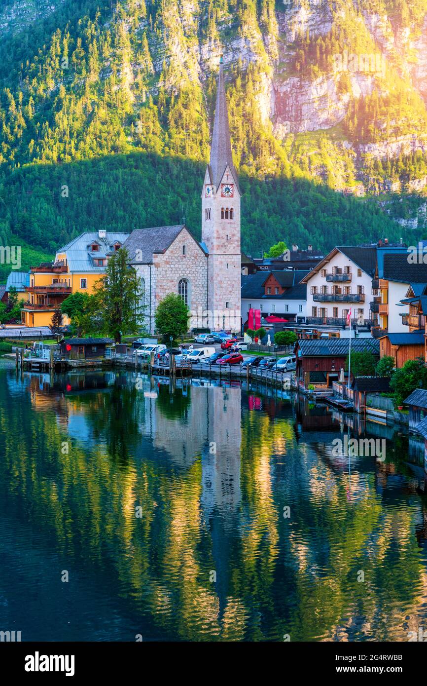 View of famous Hallstatt mountain village in the Austrian Alps at beautiful light in summer ...