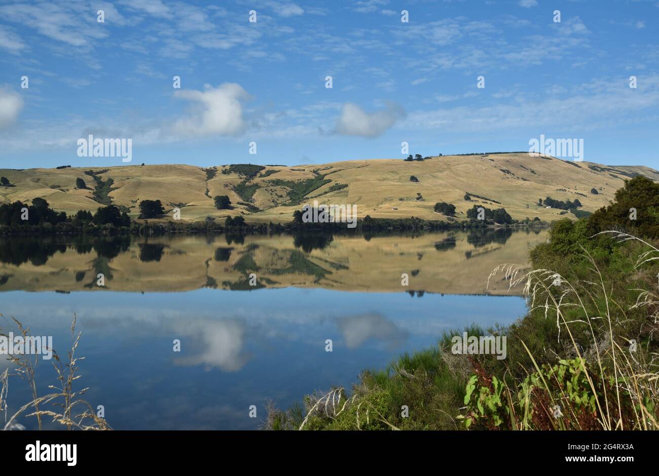 reflections in lake caitlin Stock Photo - Alamy