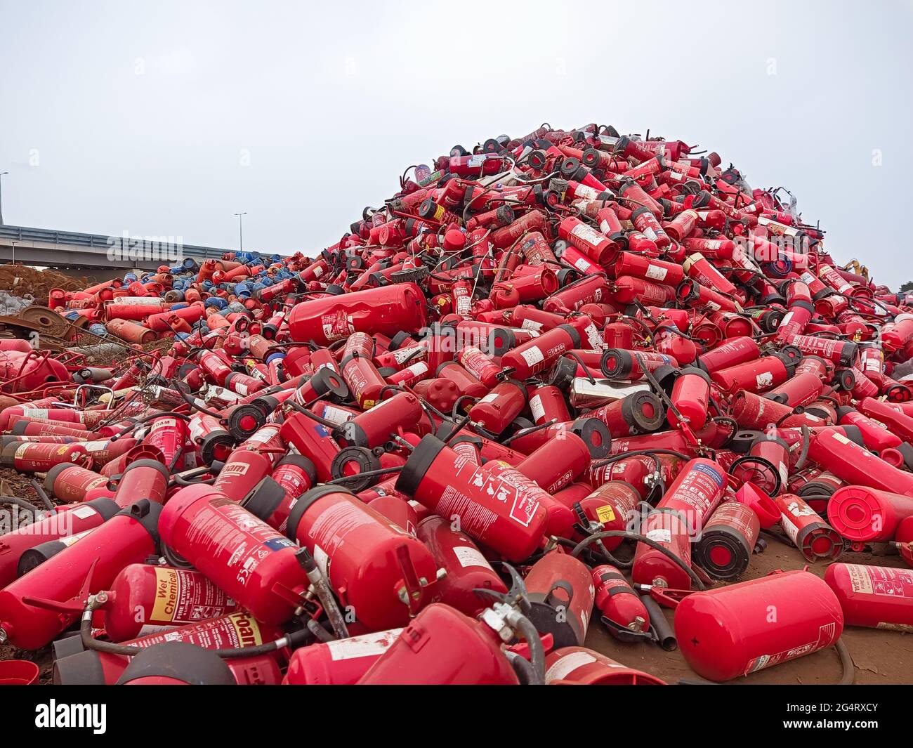 Used powder and foam fire extinguishers in a landfill. Old fire ...