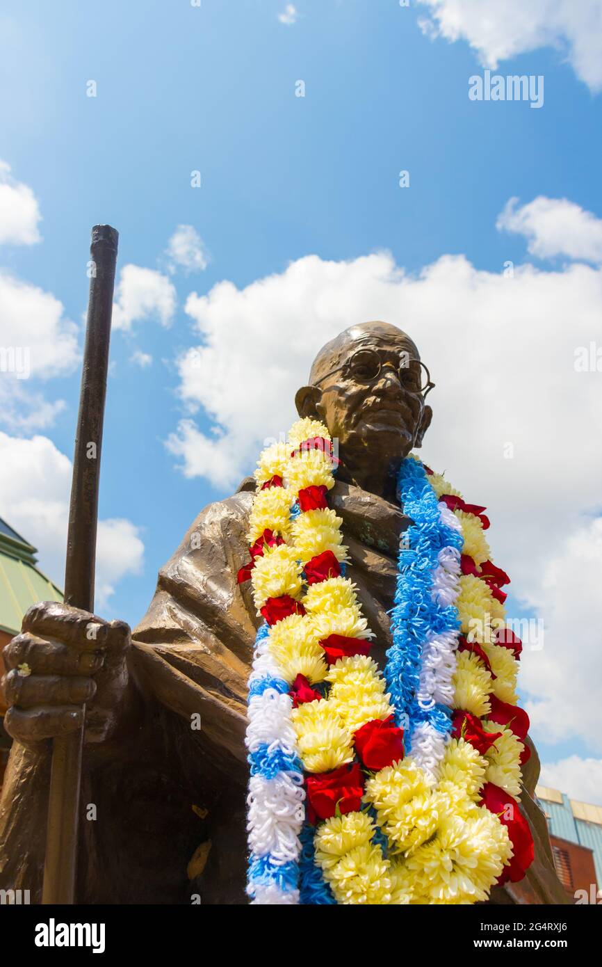 statue of Ghandi with flower garland at the Martin Luther King memorial ...