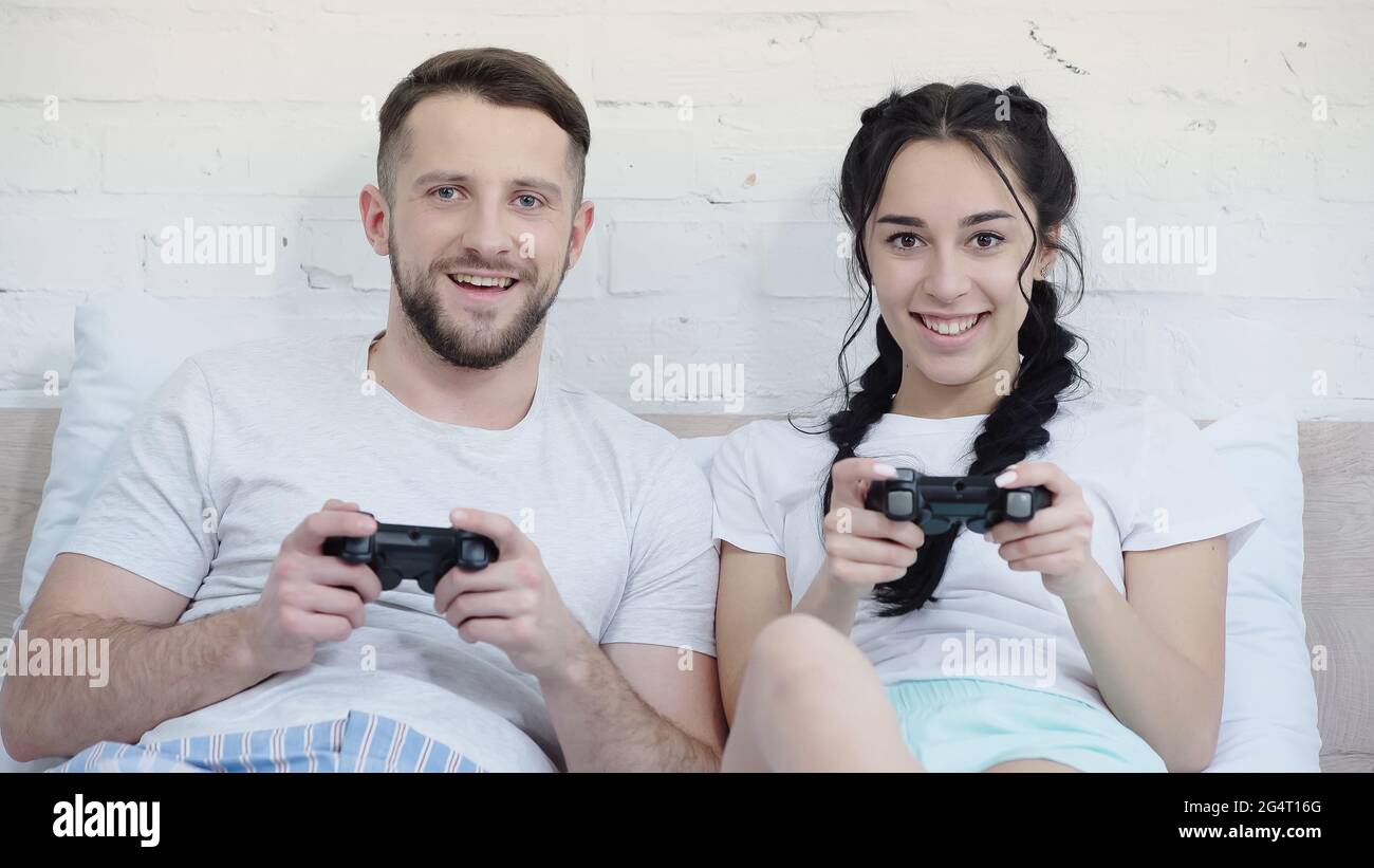 Man video camera bedroom hi-res stock photography and images - Alamy