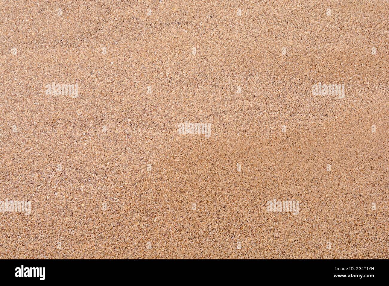 Beach small stone sand as background Stock Photo - Alamy