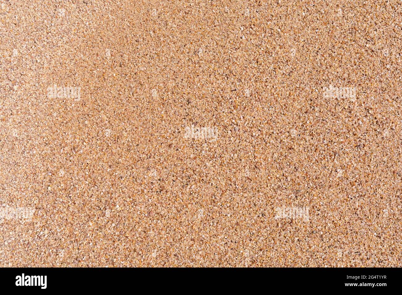 Beach small stone sand as macro background Stock Photo - Alamy