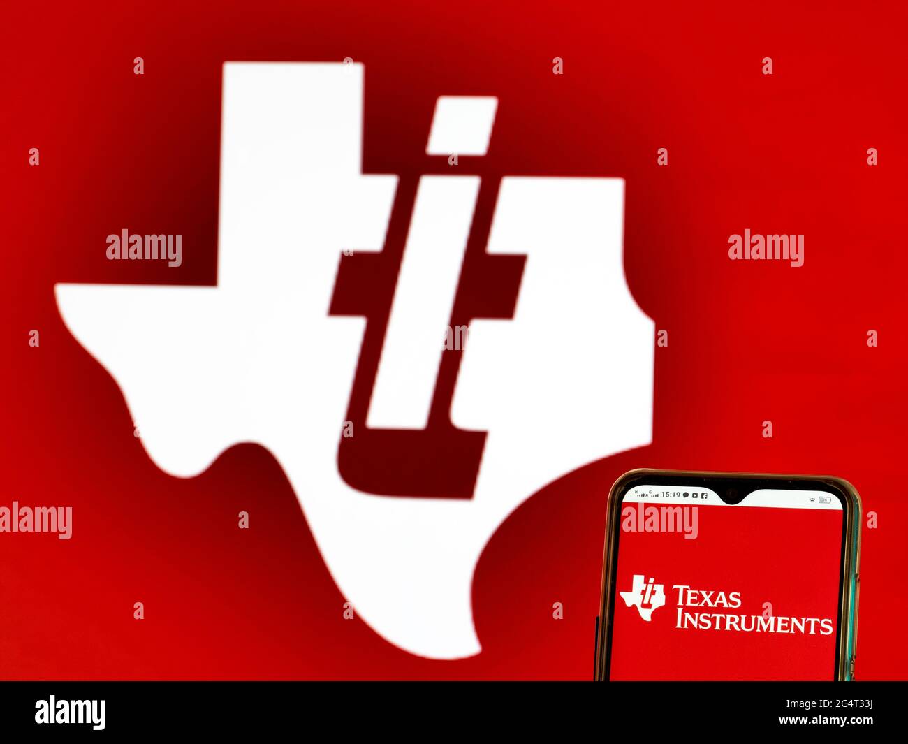 In this photo illustration a Texas Instruments Incorporated logo seen ...