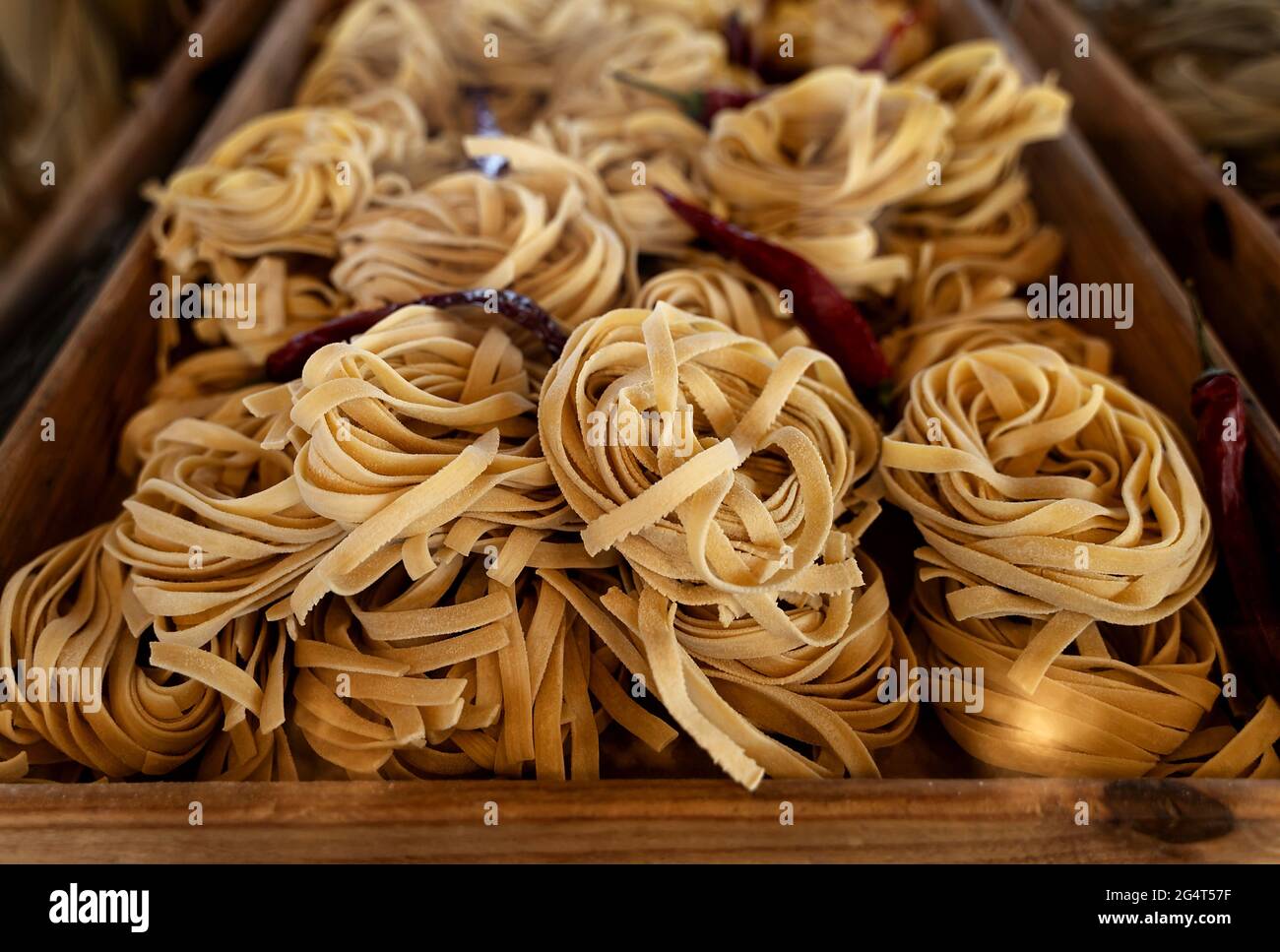 Pasta display in Italian restaurant background. Restaurant interior in ...