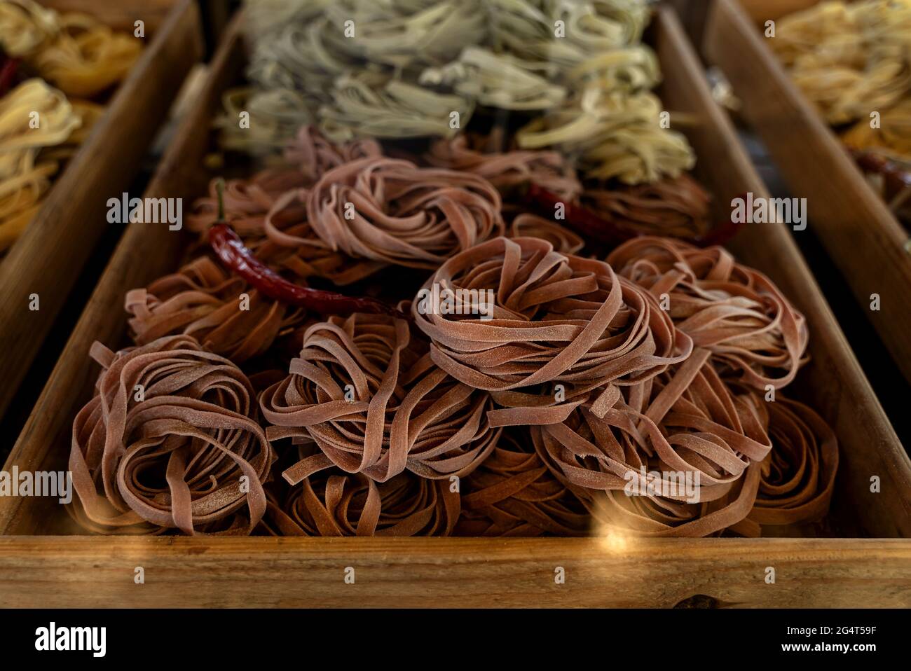 Pasta display in Italian restaurant background. Restaurant interior in ...