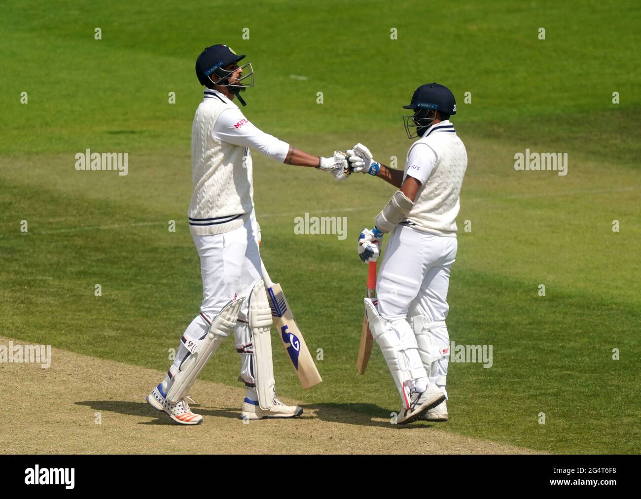 India's Ishant Sharma (left) and Mohammed Shami celebrate during day ...