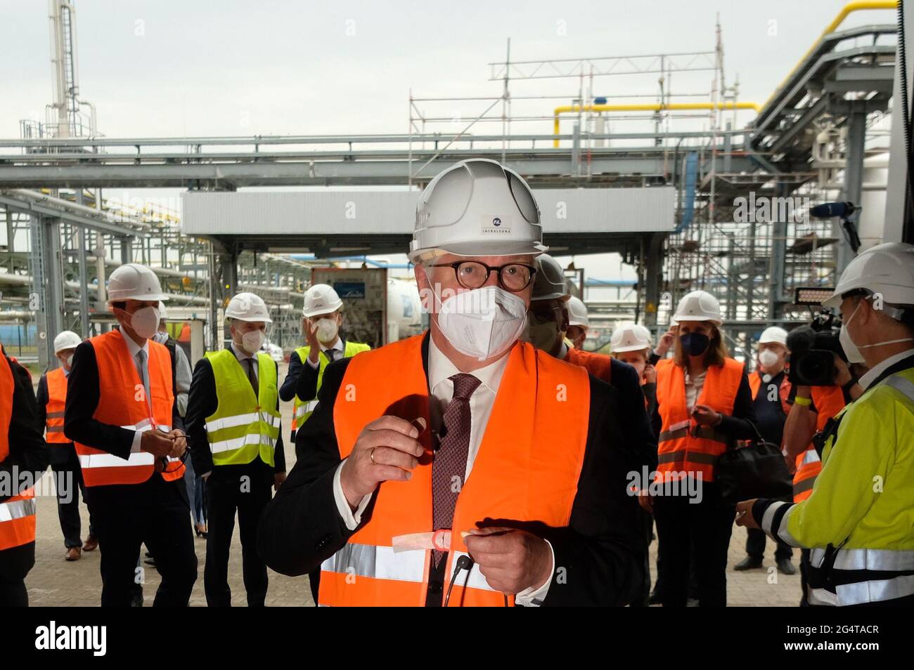 Leuna, Germany. 23rd June, 2021. Frank-Walter Steinmeier (M), Federal ...