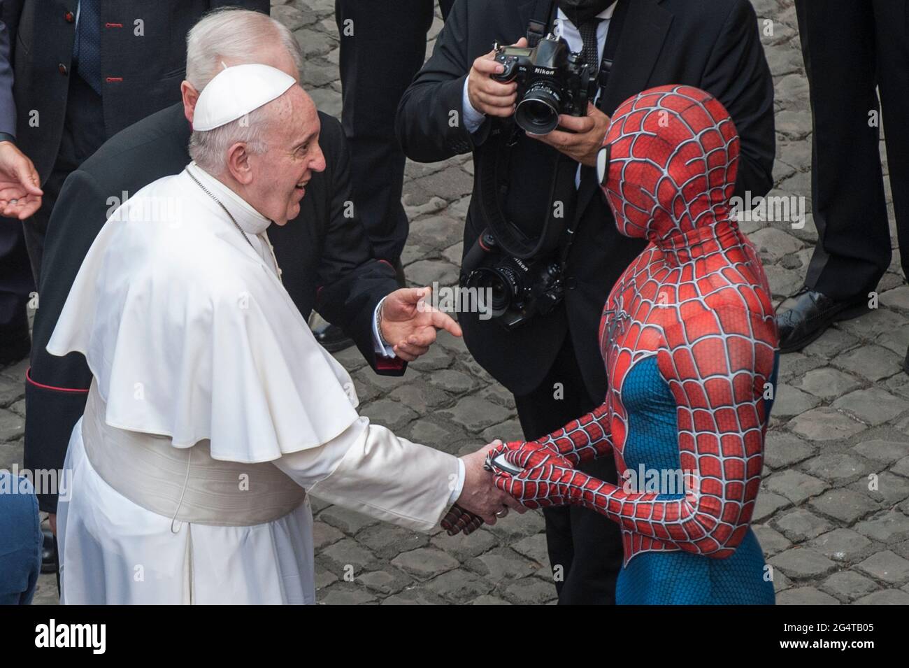 June 23, 2021 : Pope Francis greets a faithful dressed as Spider-Man ...