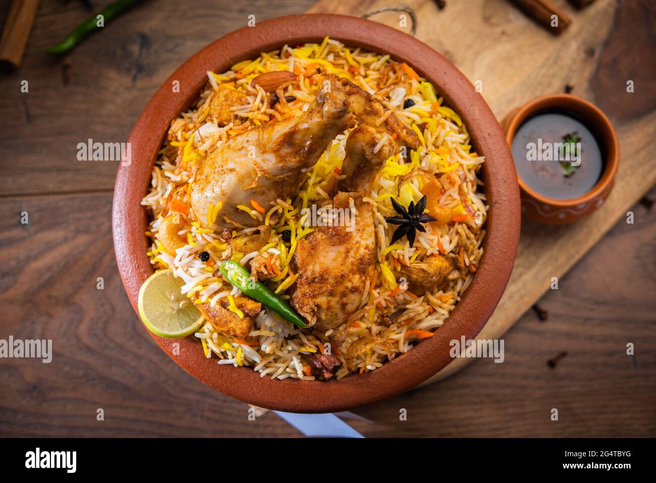 Dum Handi chicken Biryani is prepared in an earthen or clay pot called ...
