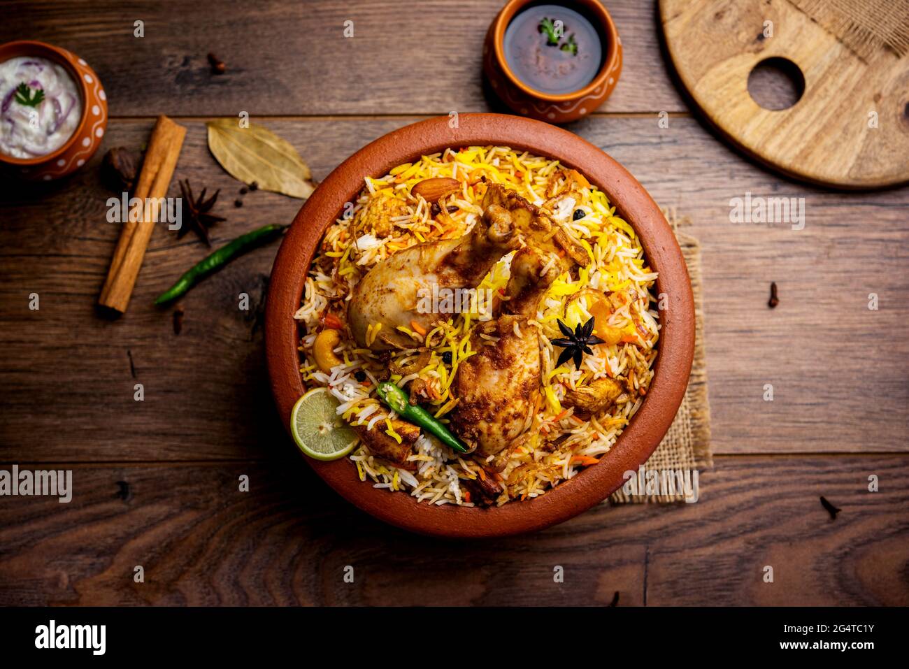 Dum Handi chicken Biryani is prepared in an earthen or clay pot called ...