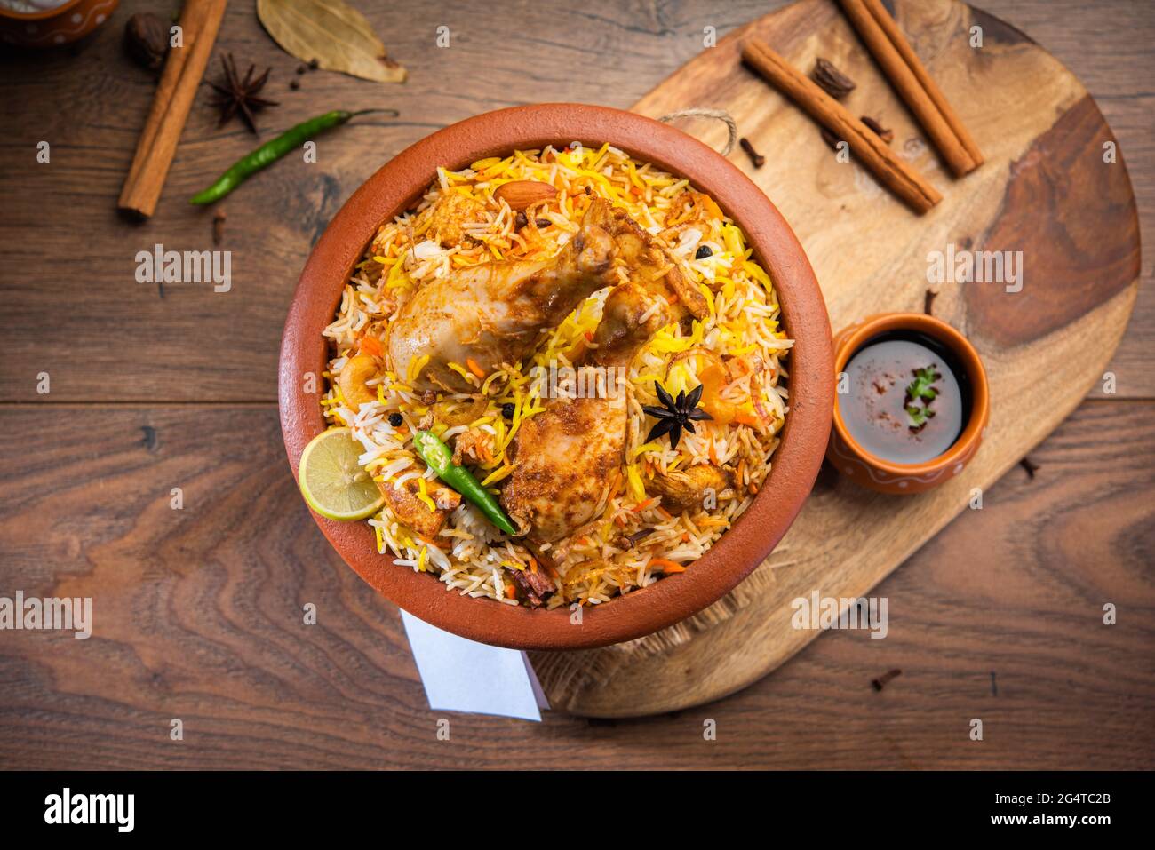 Dum Handi chicken Biryani is prepared in an earthen or clay pot called ...