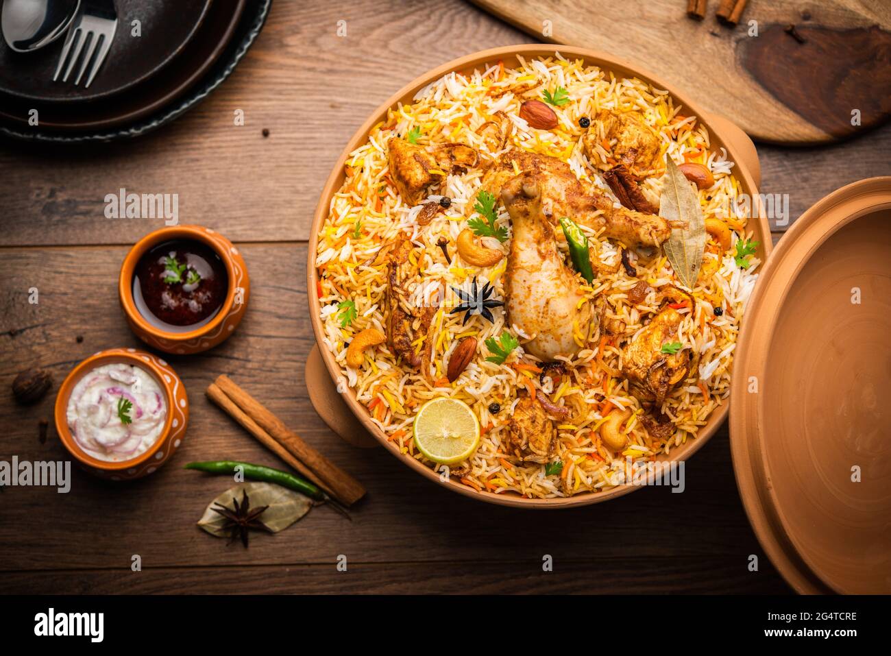 Dum Handi chicken Biryani is prepared in an earthen or clay pot called ...