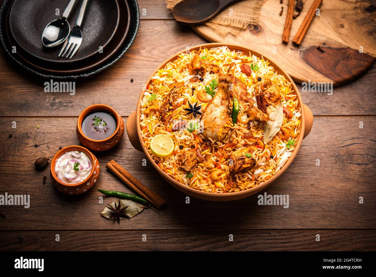 Dum Handi chicken Biryani is prepared in an earthen or clay pot called ...