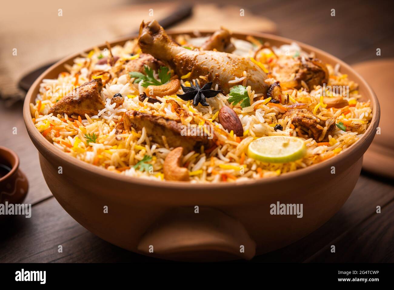 Dum Handi chicken Biryani is prepared in an earthen or clay pot called ...