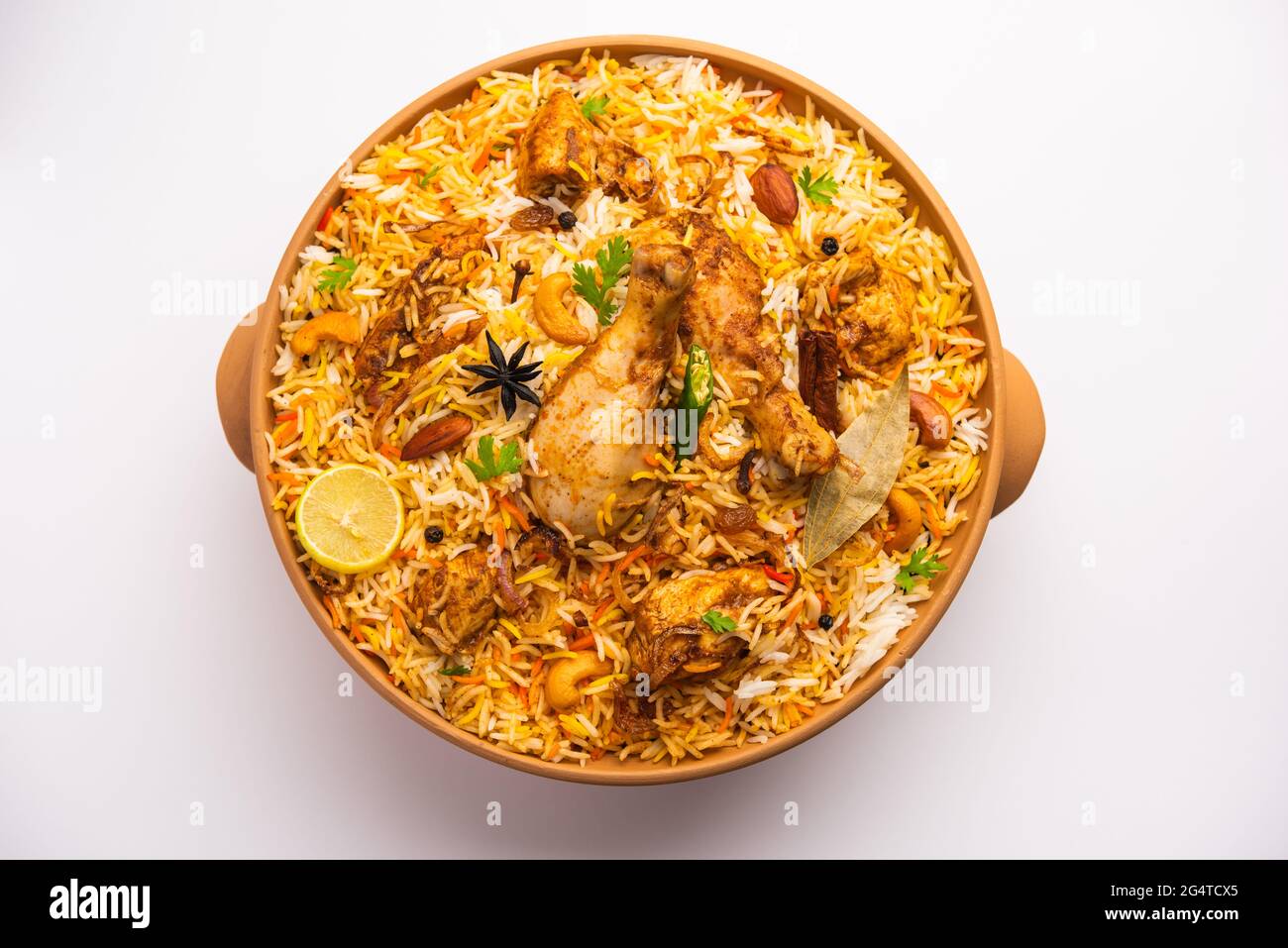 Dum Handi chicken Biryani is prepared in an earthen or clay pot called ...