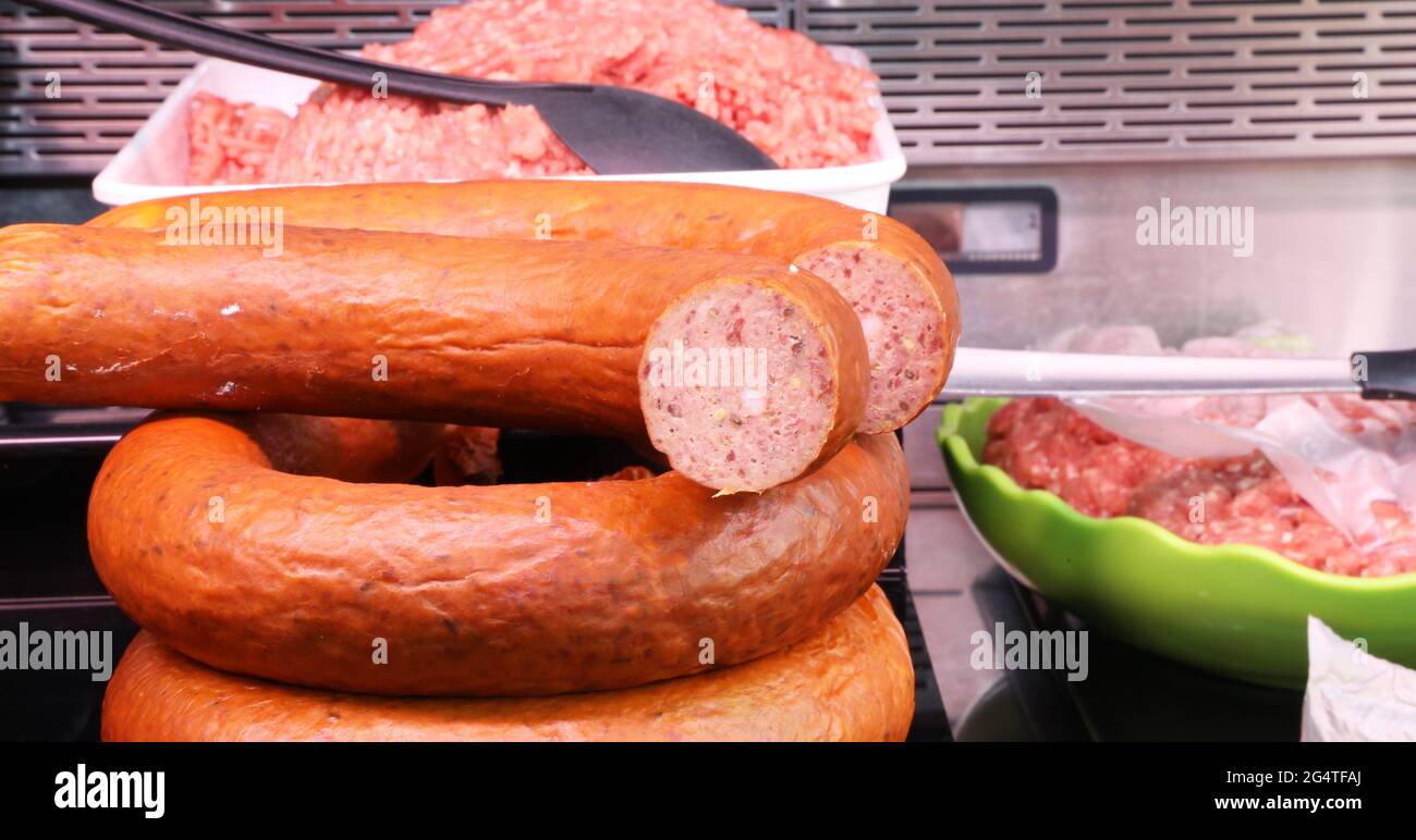 Sausage counter in a butcher's shop Stock Photo - Alamy