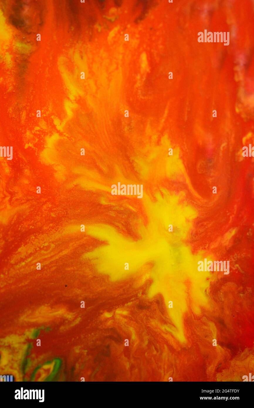 Red, green, blue, yellow colors mixed fluid macro Stock Photo - Alamy